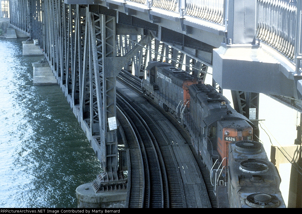 SP 4302 and 4434 Lead a long Southbound Freight On To The Steel Bridge Across The Willamette River
